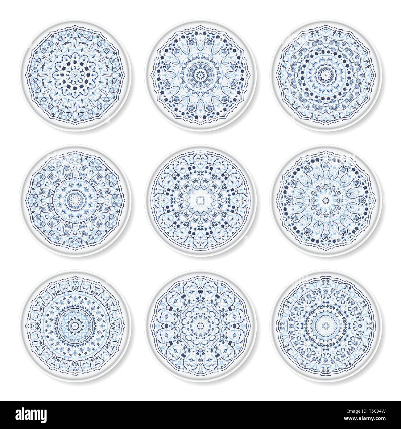 Nine blue plates with ornate Arabic pattern, top view on white ...