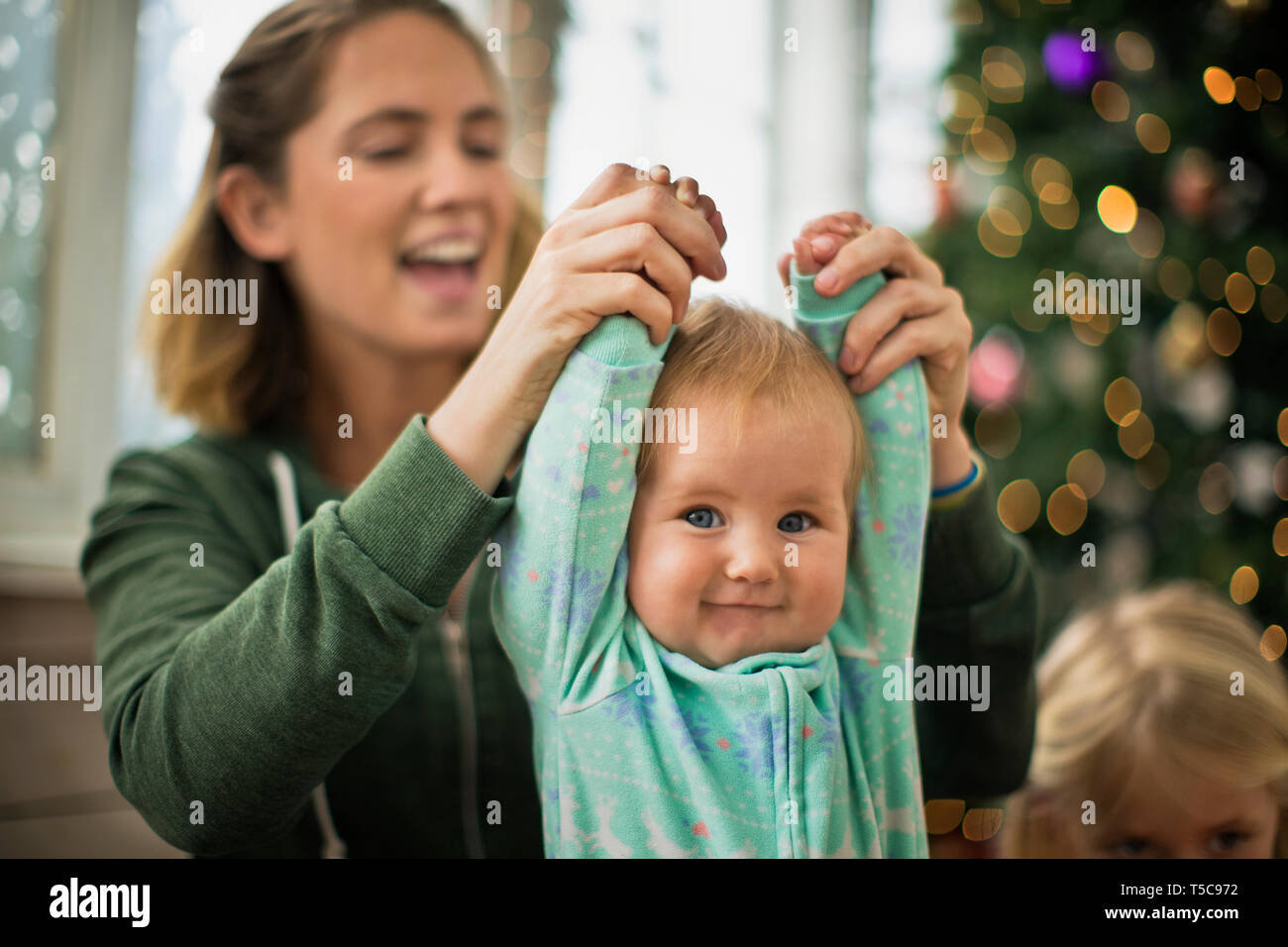 Mother baby arms smile hi-res stock photography and images - Alamy