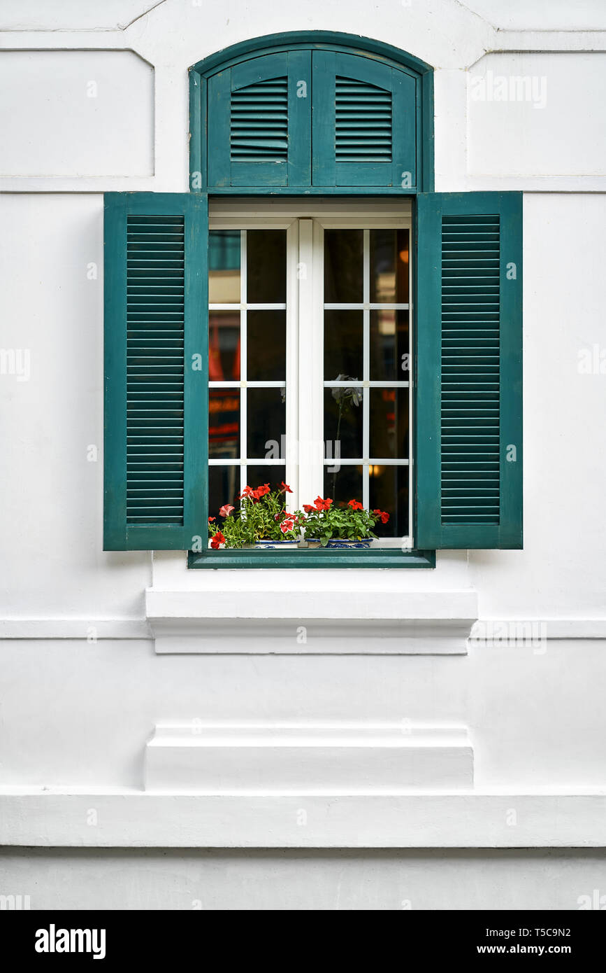 Exterior of light vietnamese house with vintage window Stock Photo - Alamy