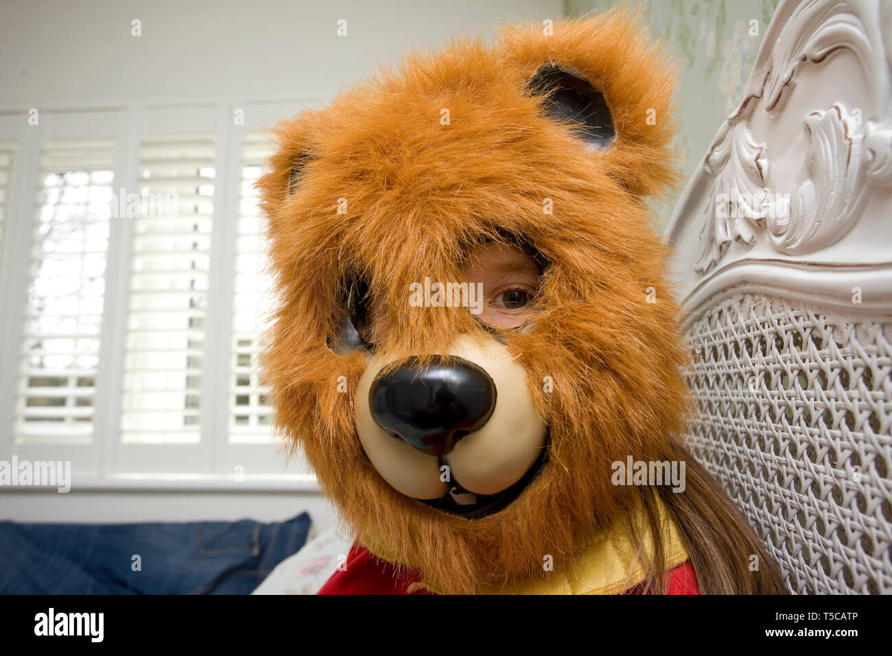 young girl wearing bear mask Stock Photo - Alamy