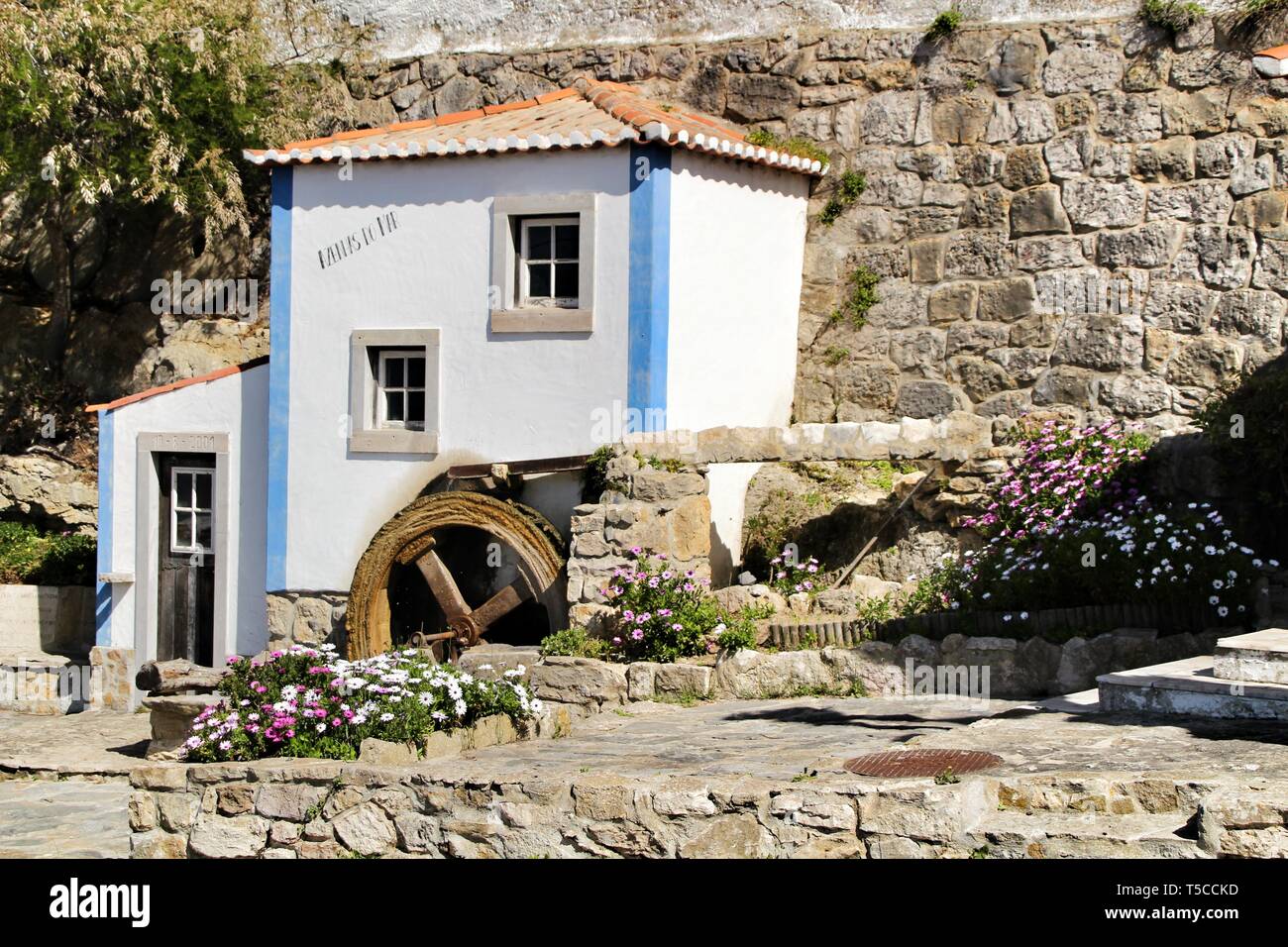 Beautiful and colorful waterwheel in Azenhas do Mar in Lisbon, Portugal ...