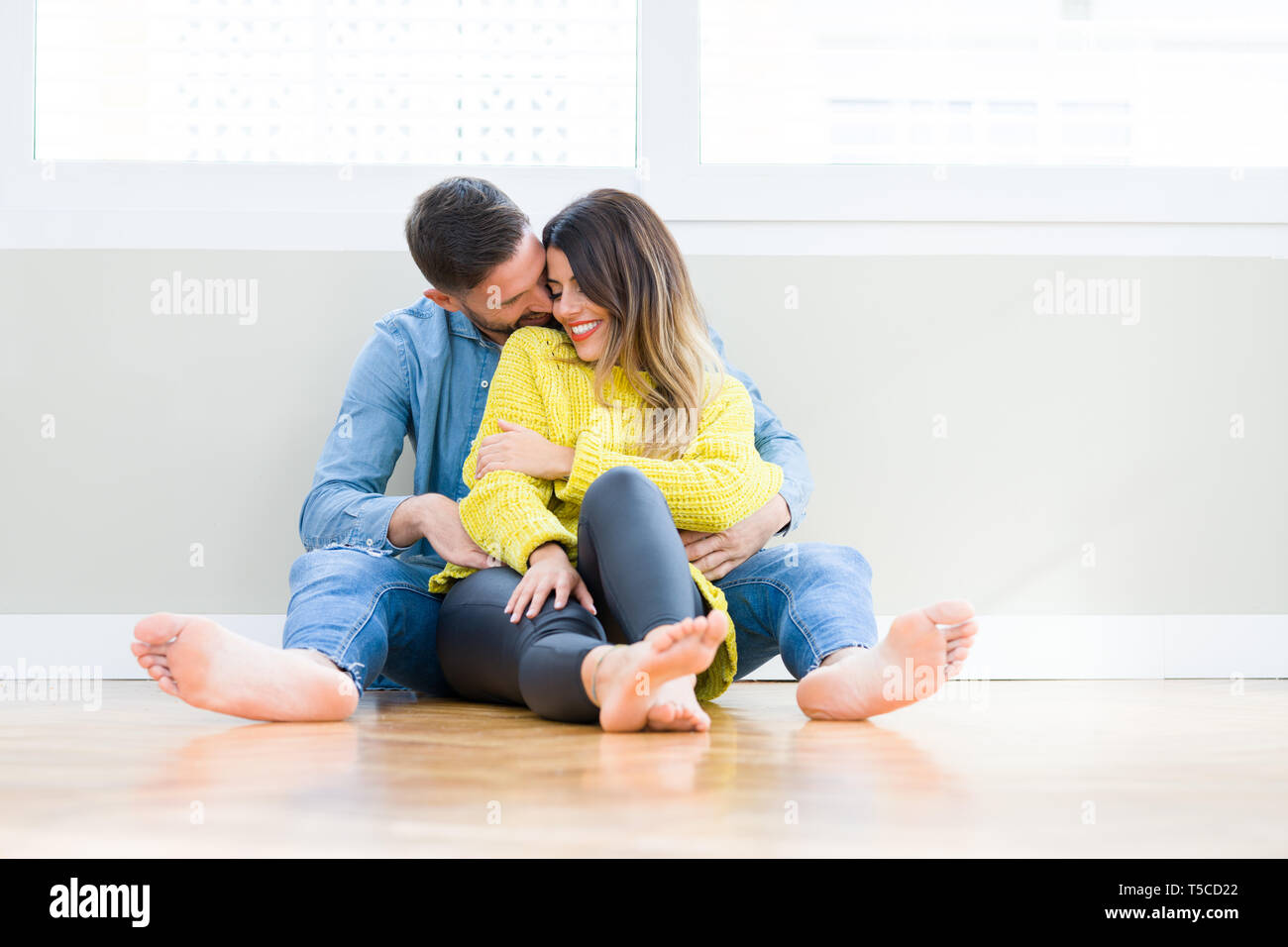 Couple Kissing Sitting Floor Stock Photos & Couple Kissing Sitting ...