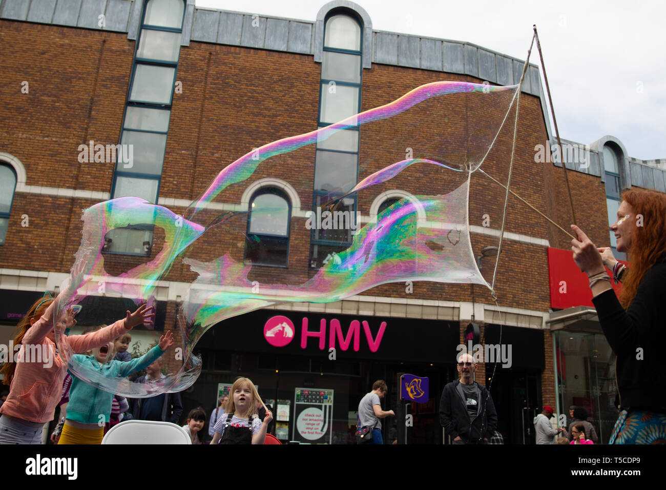 23rd April 2019 High Street Belfast,Antrim,UK Large bubble being blown ...
