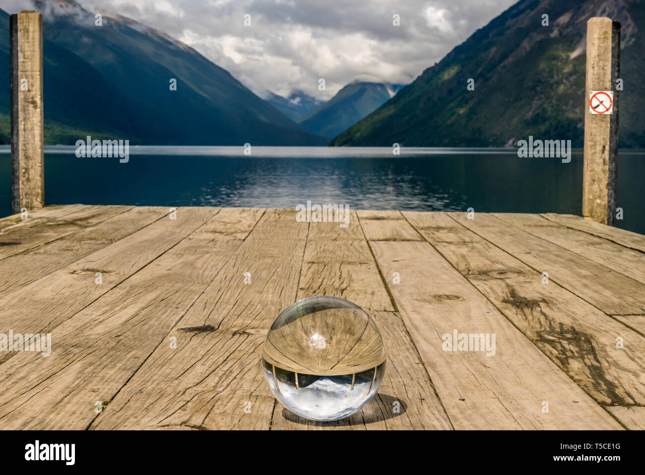 Crystal ball lake view on the jetty Stock Photo - Alamy