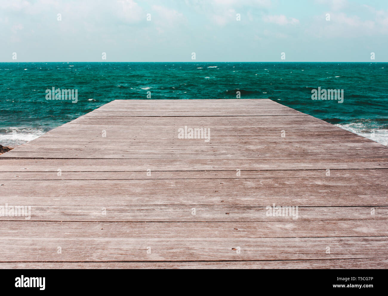 Wooden old bridge, pier, pier in the sea, ocean.Summer background with ...