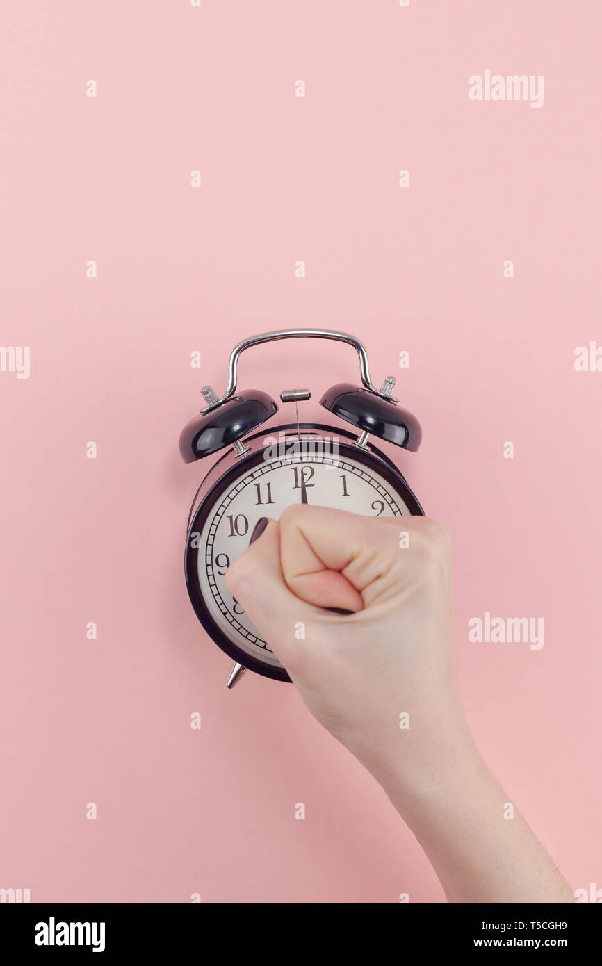 Creative flat lay morning time emotions concept top view of woman hand ...