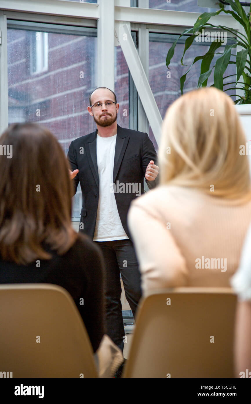 Abstract people lecture in seminar room, education or training concept ...