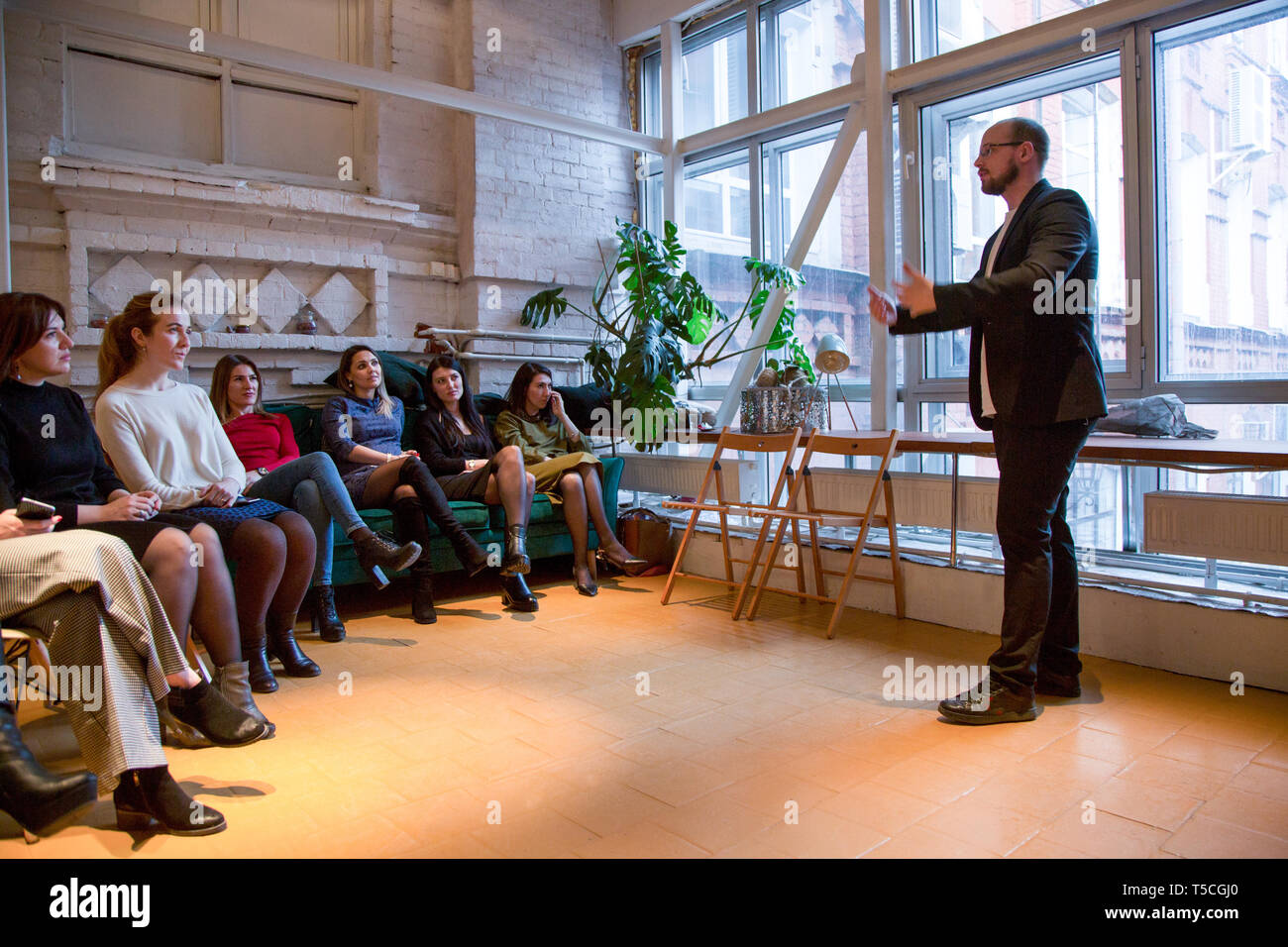 Abstract people lecture in seminar room, education or training concept ...