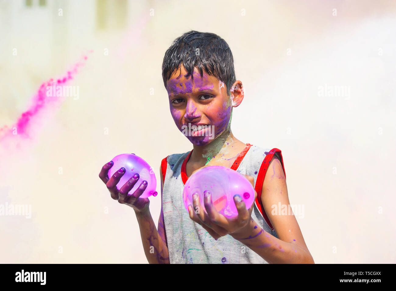 Kid celebrating holi festival hi-res stock photography and images - Alamy