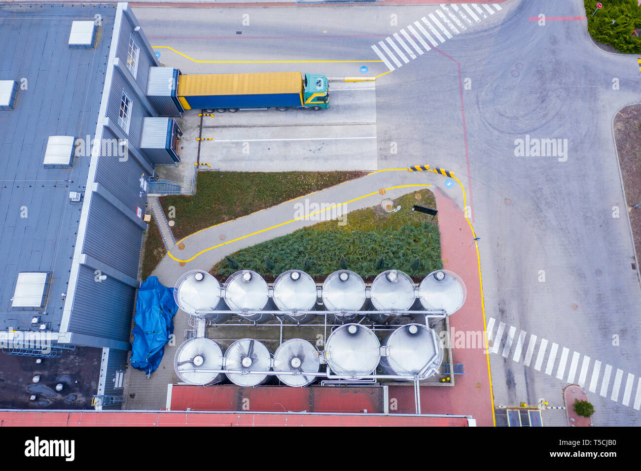 Aerial Side Shot of Industrial Warehouse Loading Dock where Man Stock ...