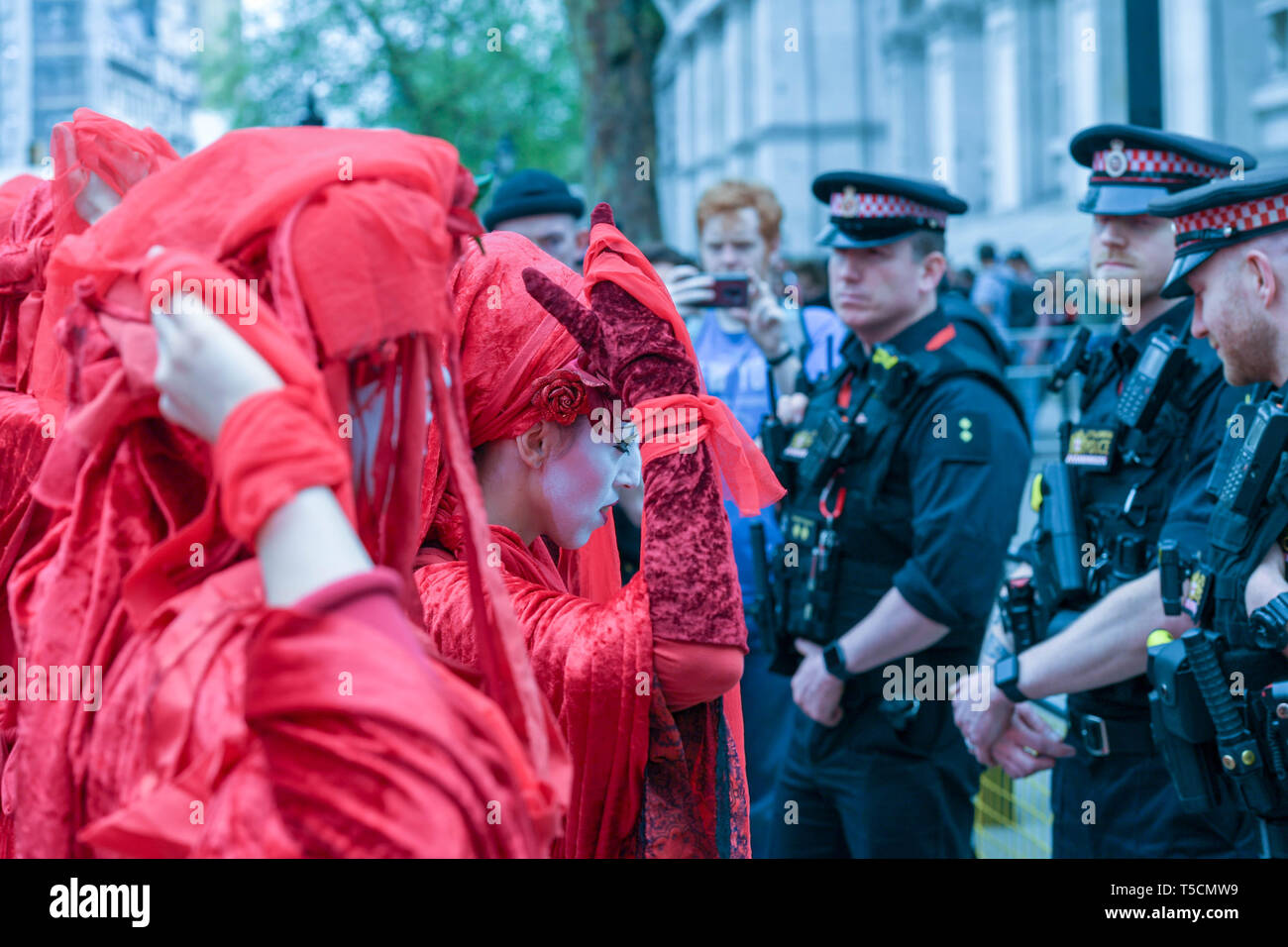 Female protesters in red outside dowing street hi-res stock photography ...