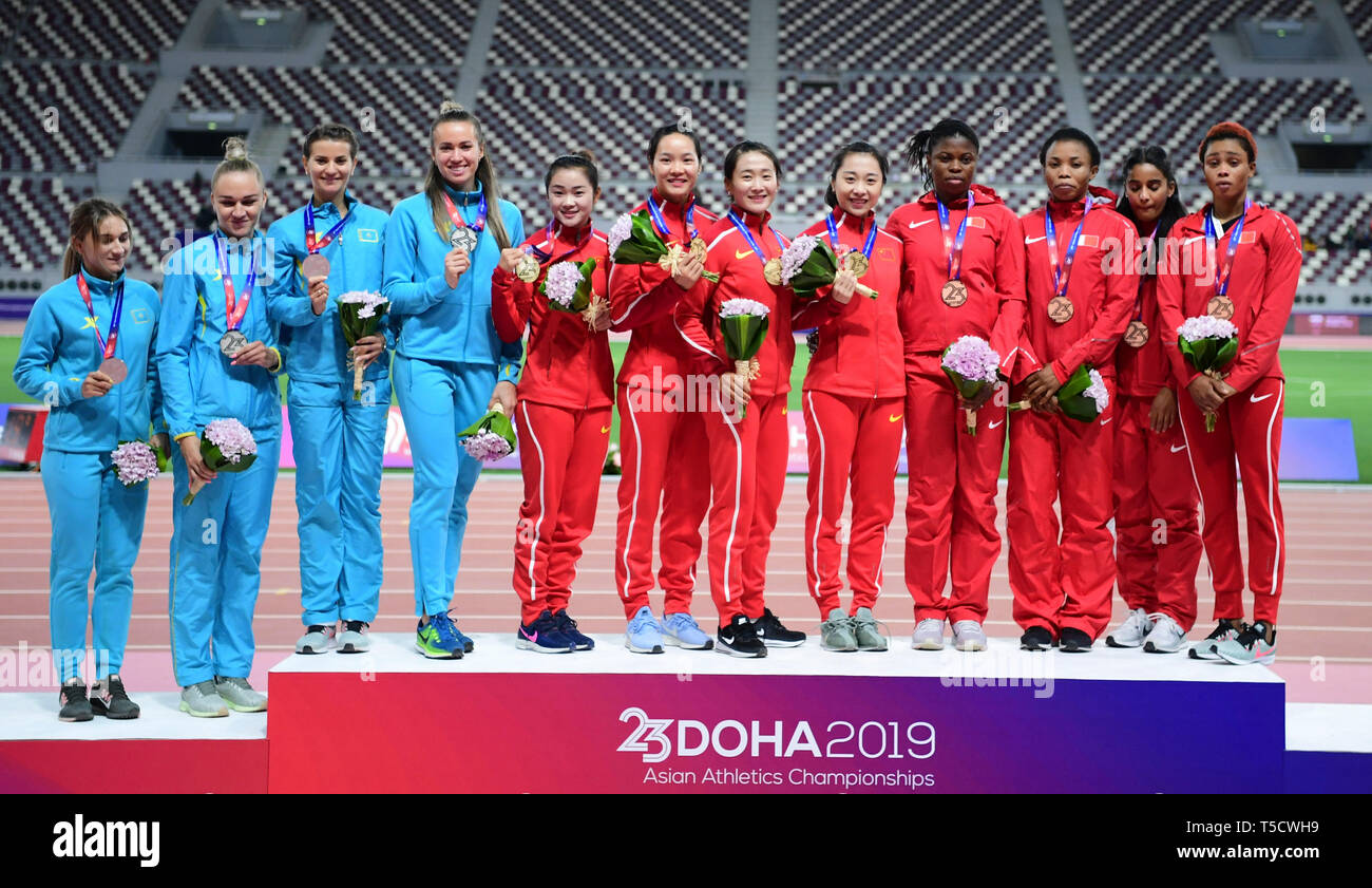 Doha, Qatar. 23rd Apr, 2019. Gold medalists team China (C), silver medalist team Kazakhstan (L ...