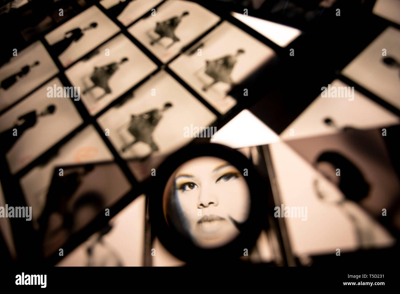 Berlin, Germany. 24th Apr, 2019. A portrait on a contact print can be ...