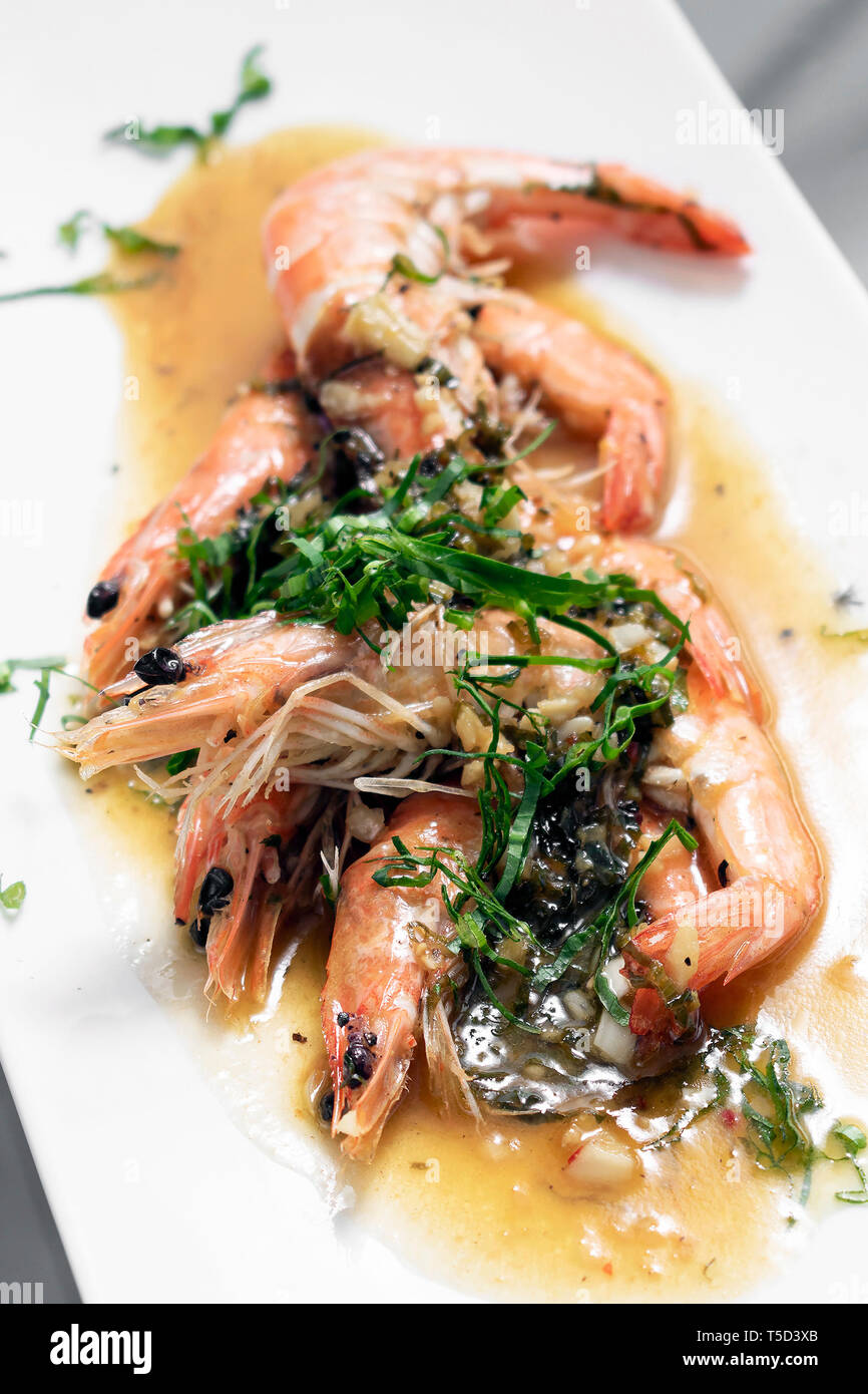 asian prawns sauteed in spicy garlic chilli and turmeric sauce in ...