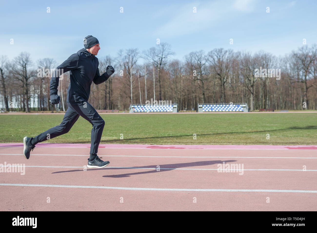 Healthy guy sprinter running outdoor hi-res stock photography and ...