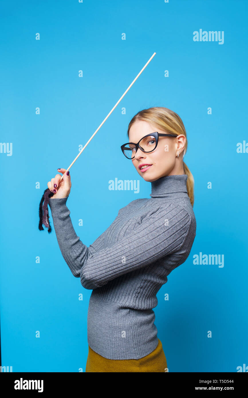 Photo of woman teacher with pointer Stock Photo - Alamy