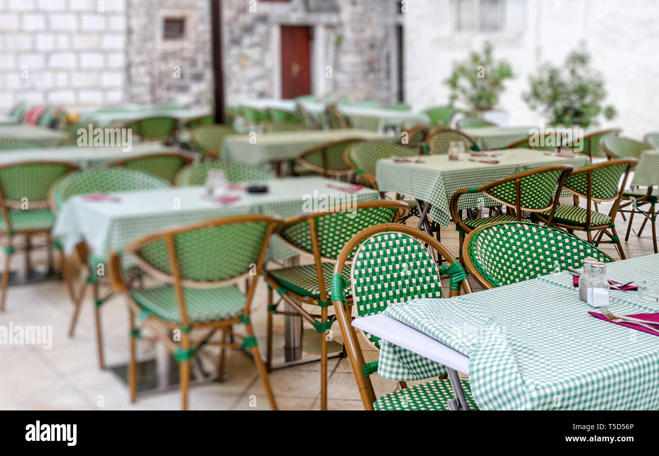 Tables in the restaurant in the open air Stock Photo - Alamy