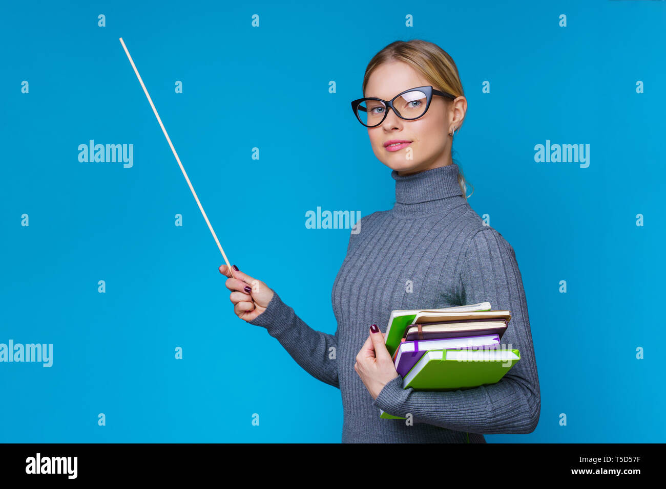 Holding pointer stick hi-res stock photography and images - Alamy