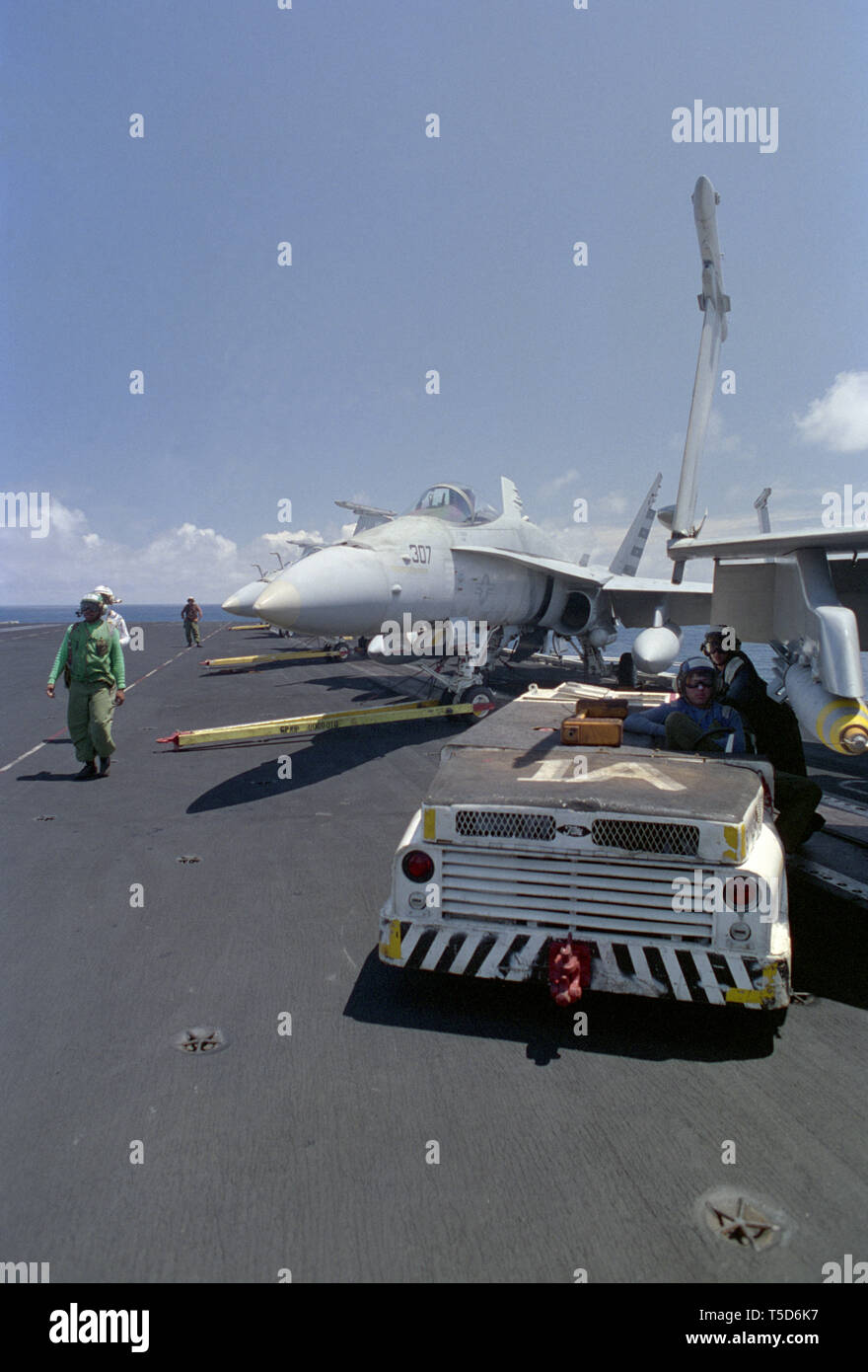 Us navy flight deck tractor hi-res stock photography and images - Alamy