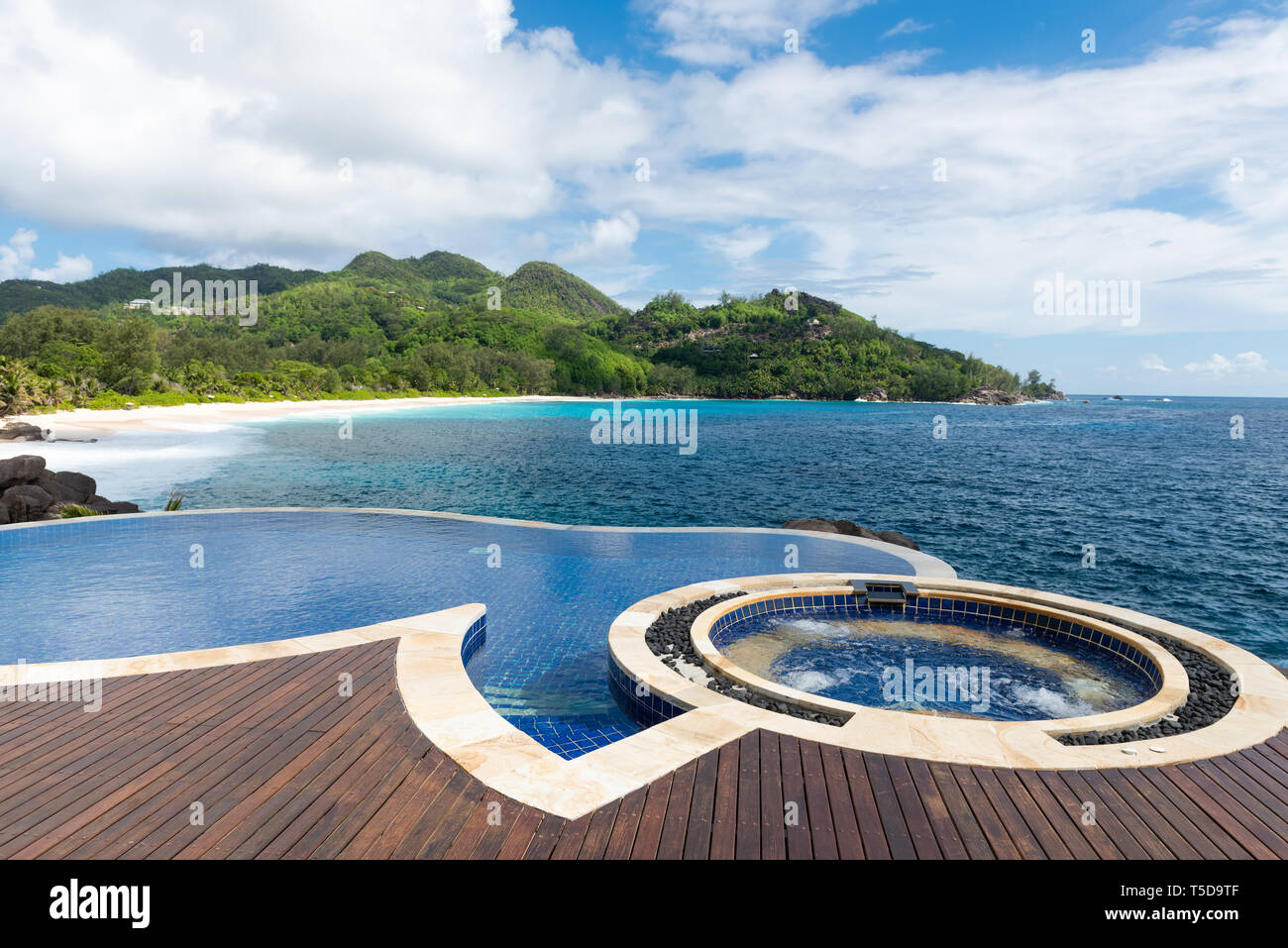 Swimming pool resort surface on Seychelles coast. Beautiful tropical ...