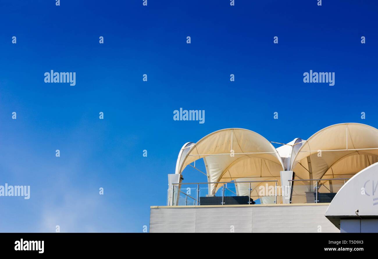 Restaurant on a roof with beautiful blue sky Stock Photo - Alamy