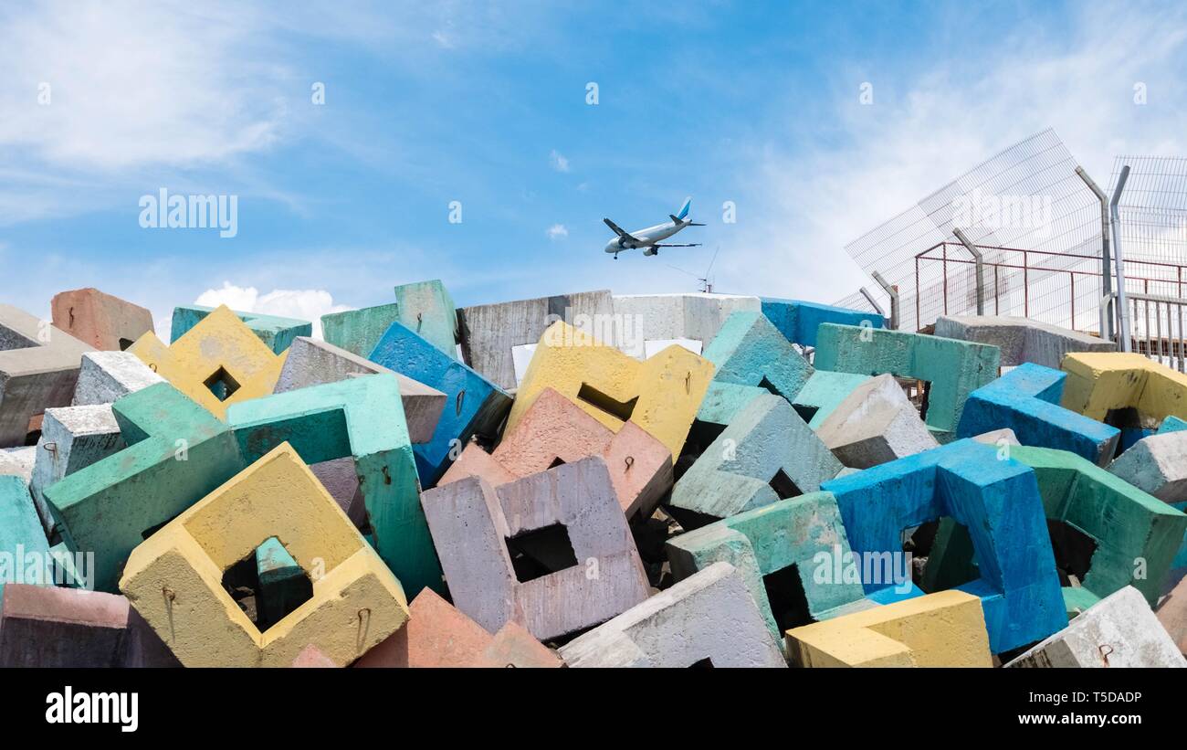 Colorful blocks with an airplane in the clouds Stock Photo - Alamy