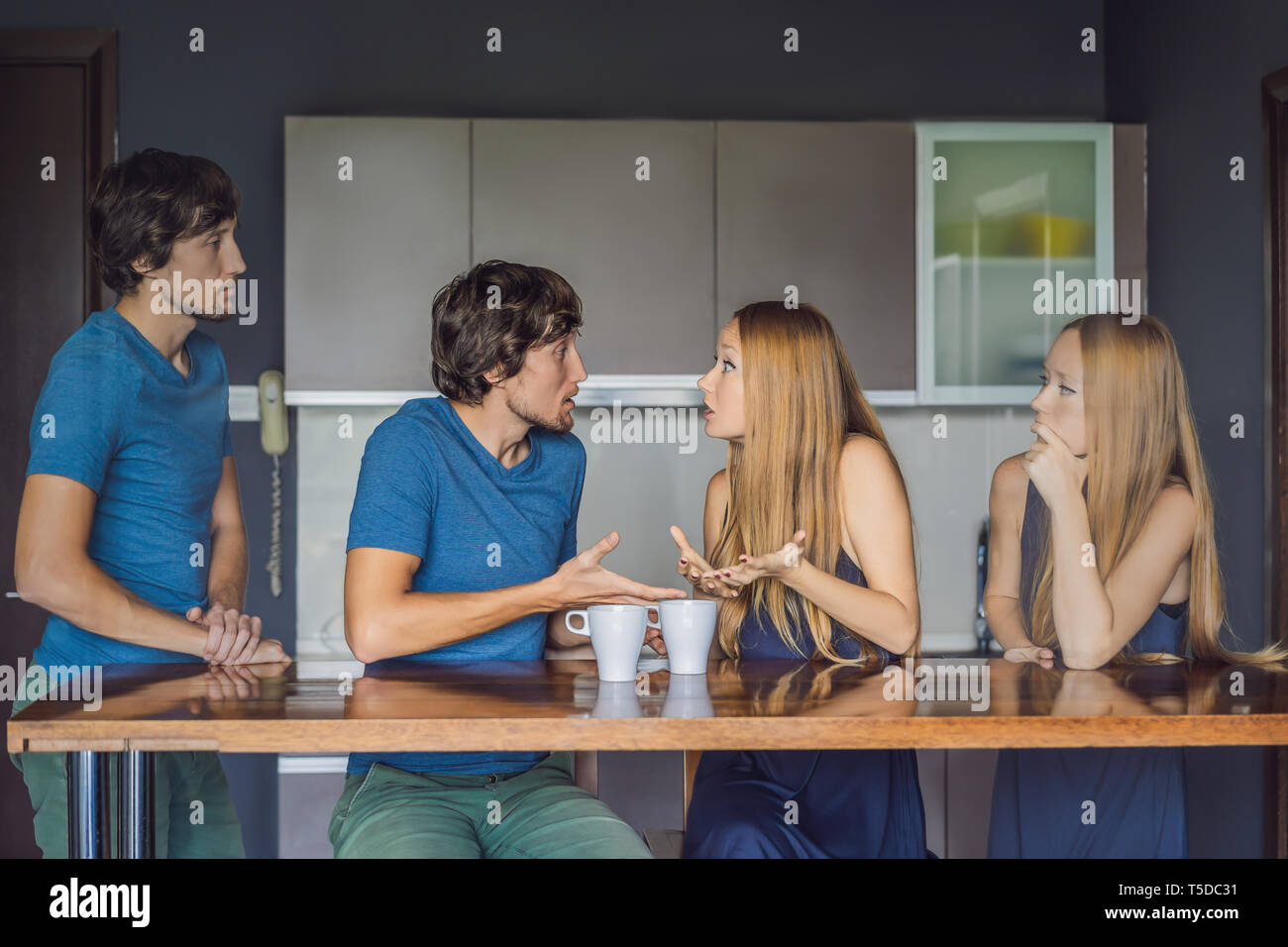 Young couple swears in the kitchen. Watch and evaluate their behavior ...