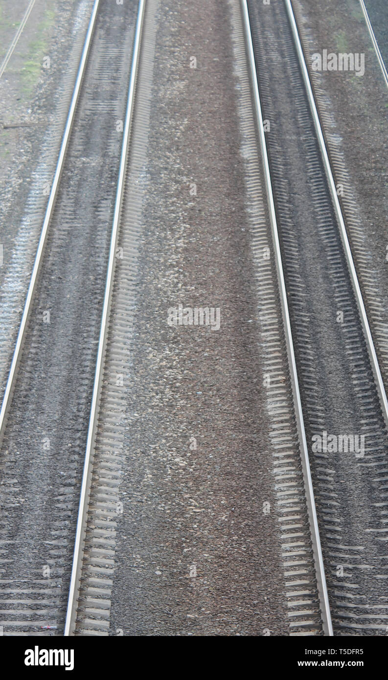 Railroad tracks stretching into the distance Stock Photo - Alamy