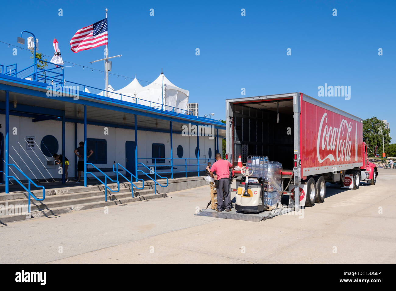 Coca-Cola truck unloading at Castaways Bar in North Avenue Beach ...