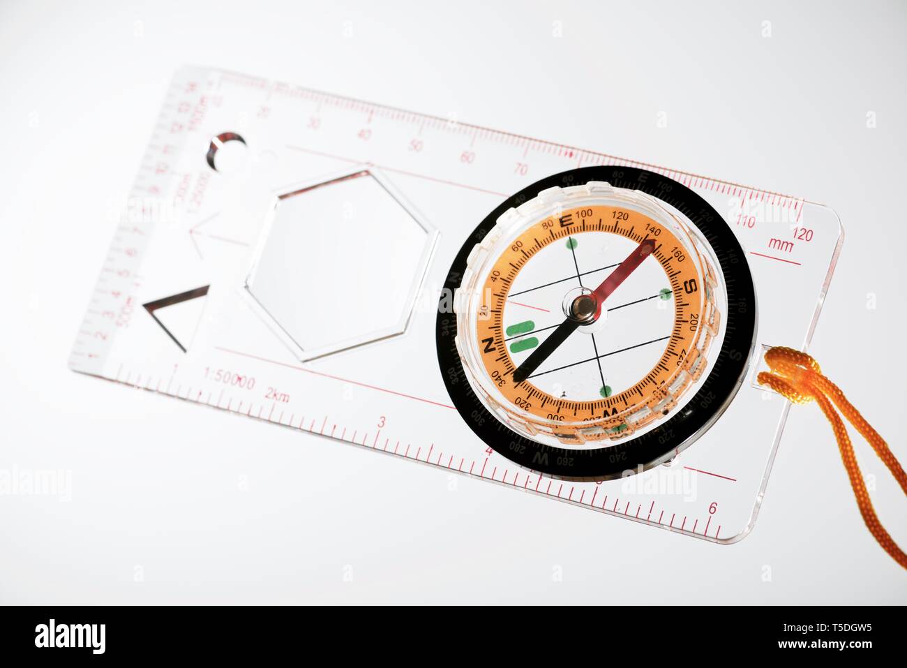 Compass close up and white background Stock Photo - Alamy