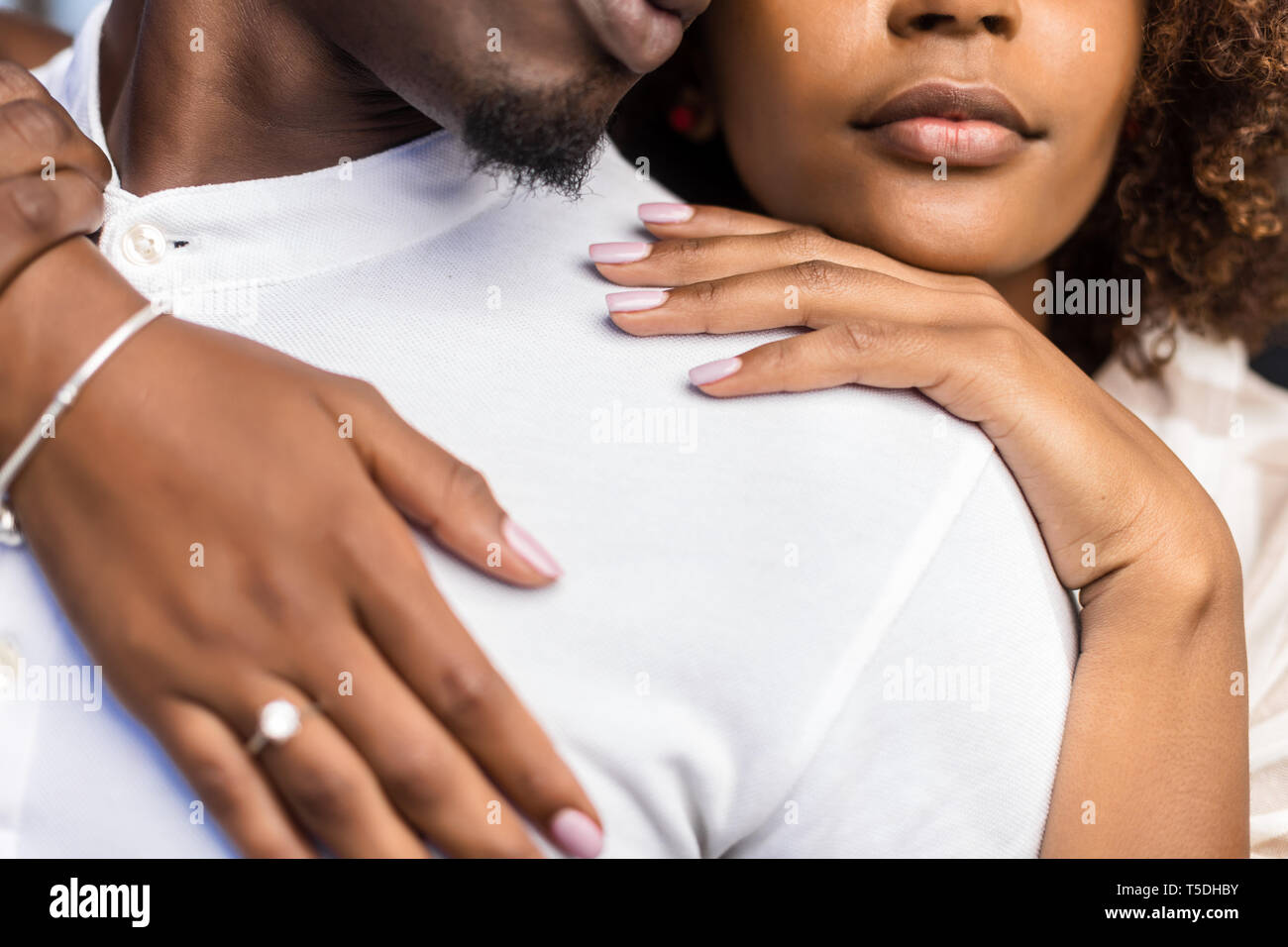 Close up outdoor protrait of black african american couple embracing ...