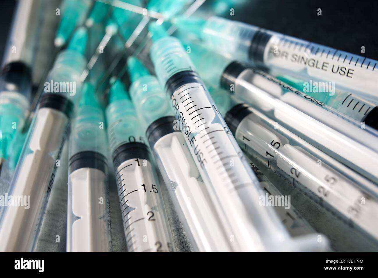 Stacked syringes hi-res stock photography and images - Alamy