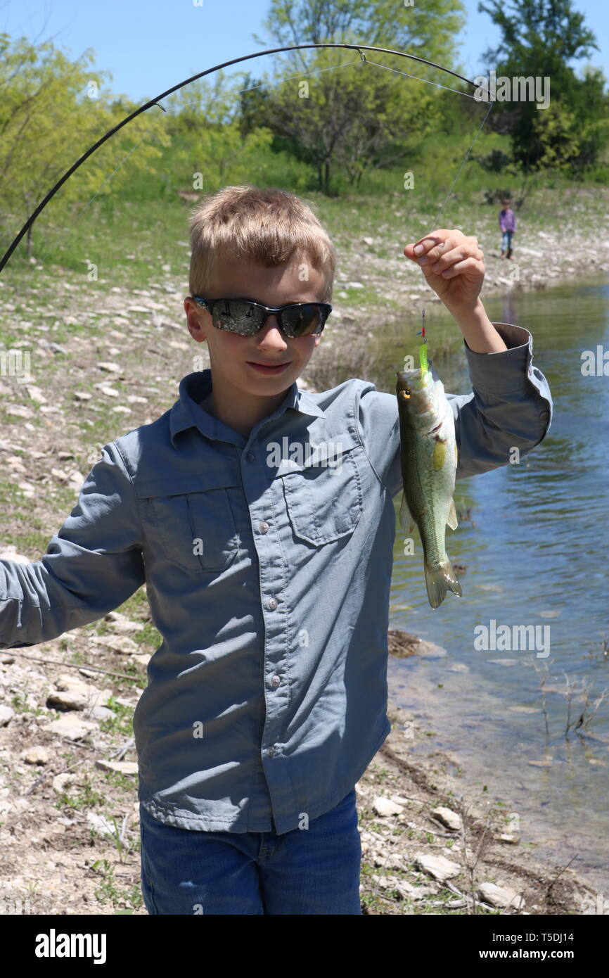 Boy fish fishing hi-res stock photography and images - Alamy