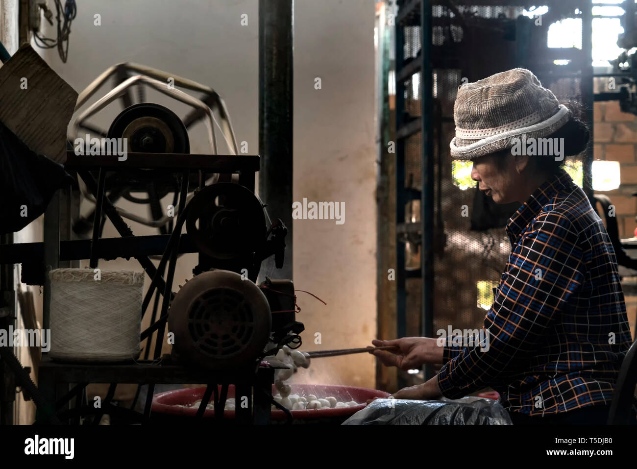 coiling silk threads Stock Photo - Alamy