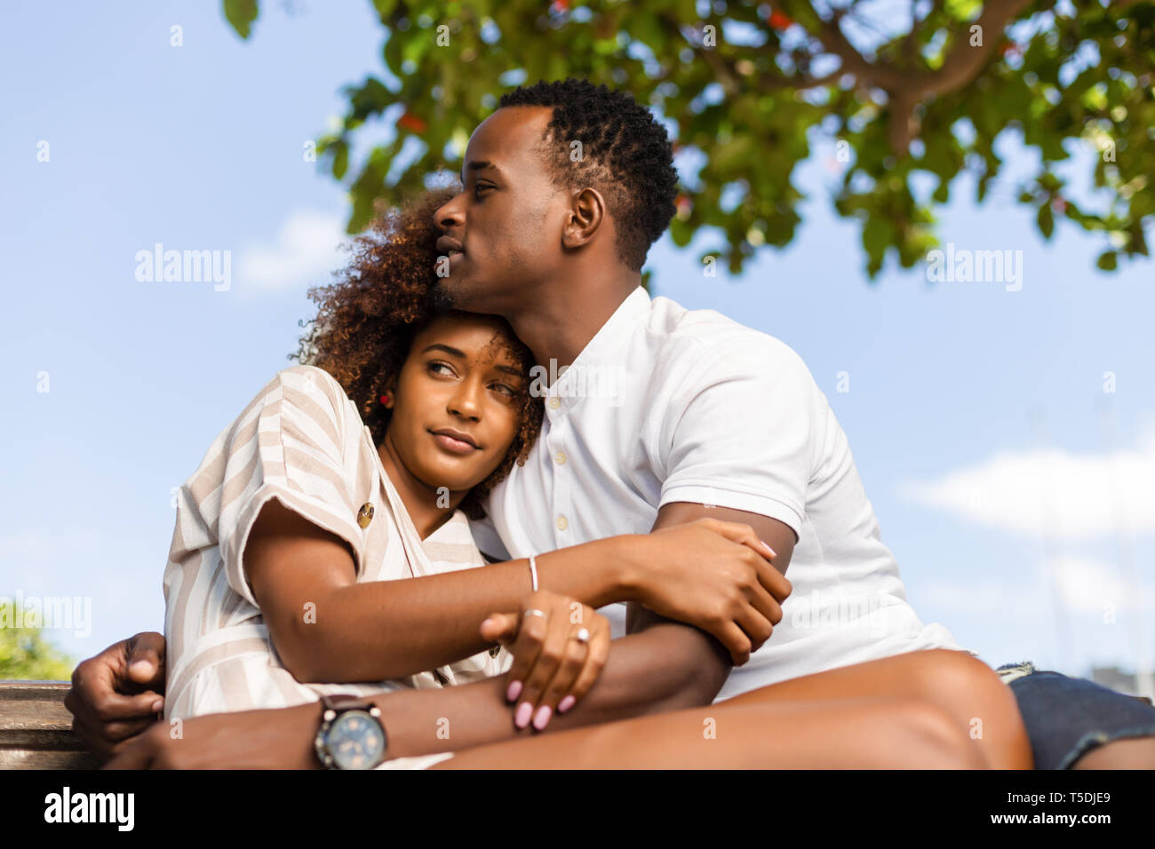 Outdoor protrait of black african american couple embracing each other ...