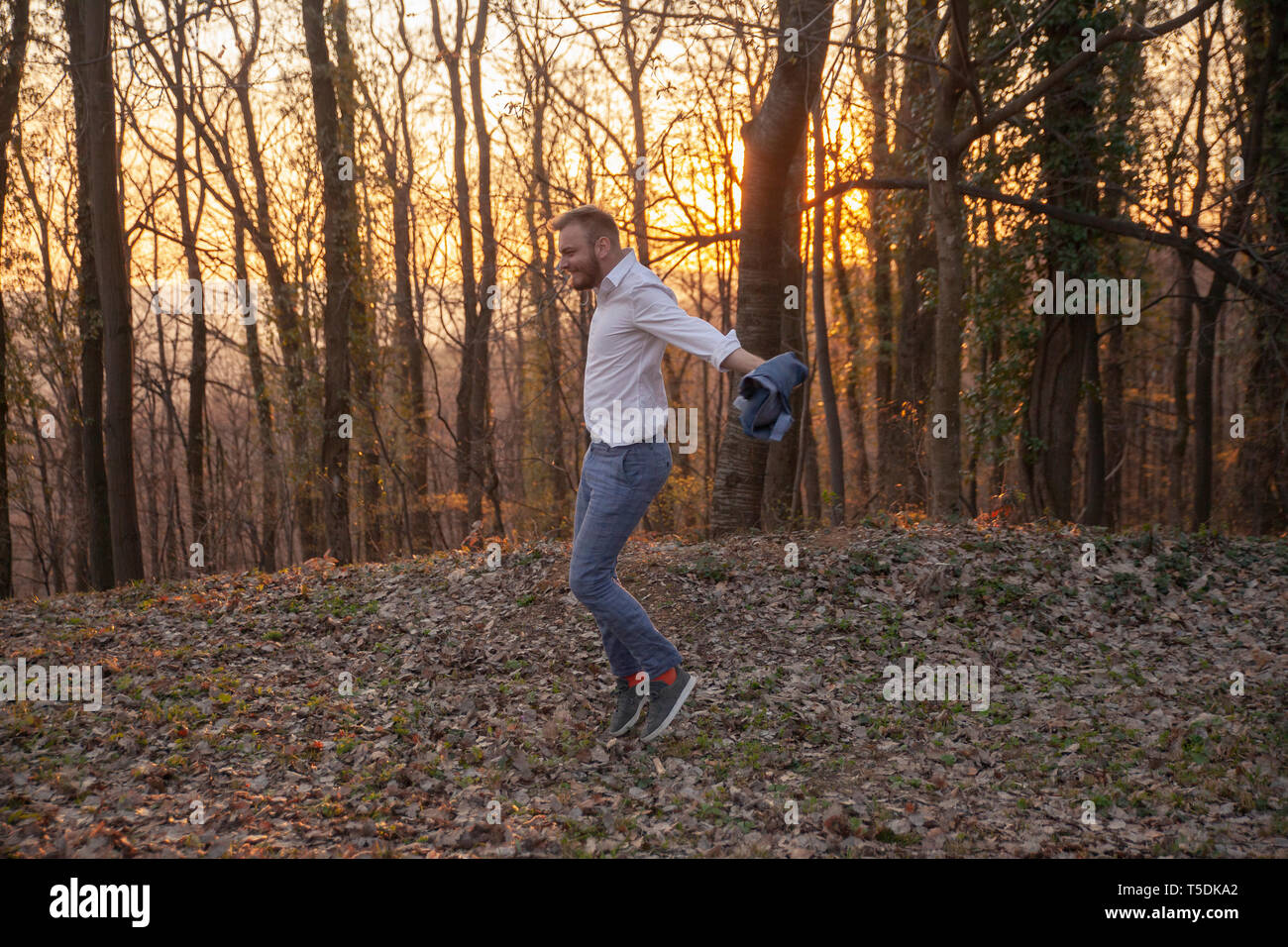 Man dancing alone in suit hi-res stock photography and images - Alamy