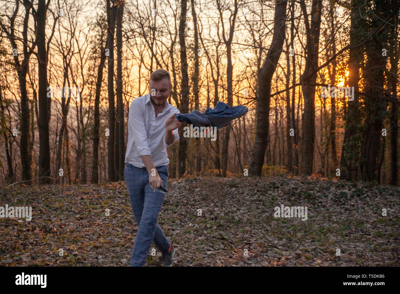 Man dancing alone in suit hi-res stock photography and images - Alamy