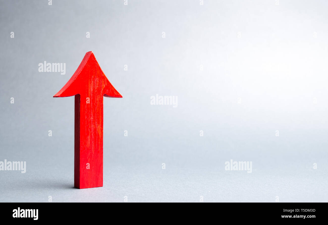 Red up arrow on gray background. The concept of growth and development ...