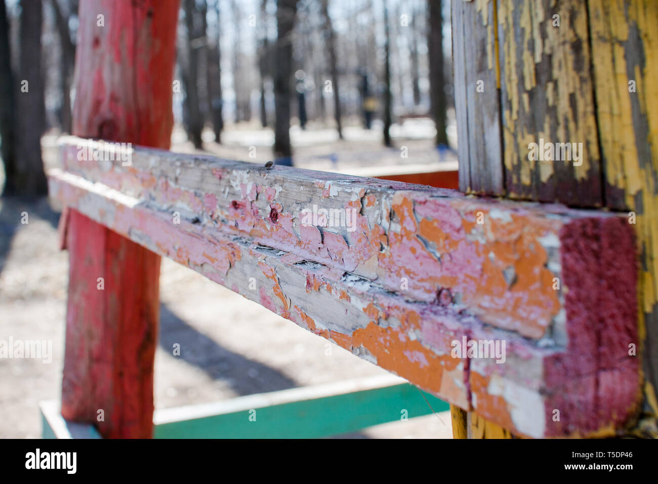 wooden structures with peeling colored paint on the playground Stock ...