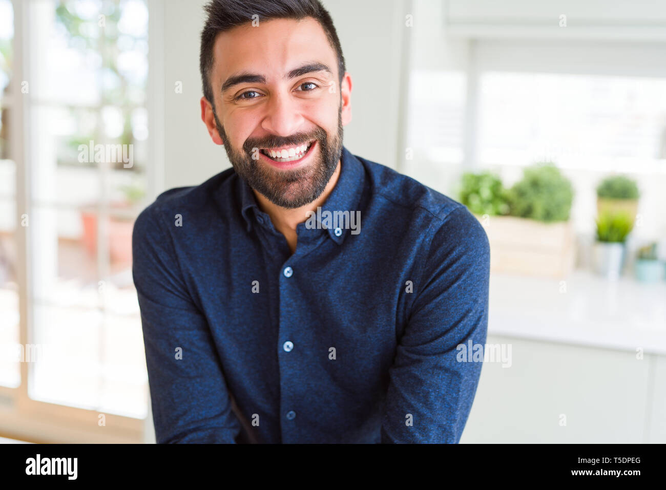 Handsome man smiling cheerful with a big smile on face showing teeth ...