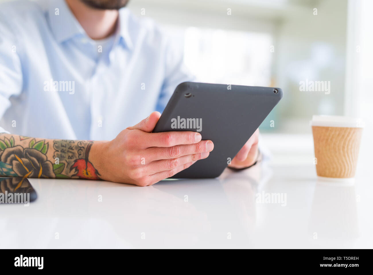 Close up of business man working using touchpad tablet Stock Photo - Alamy