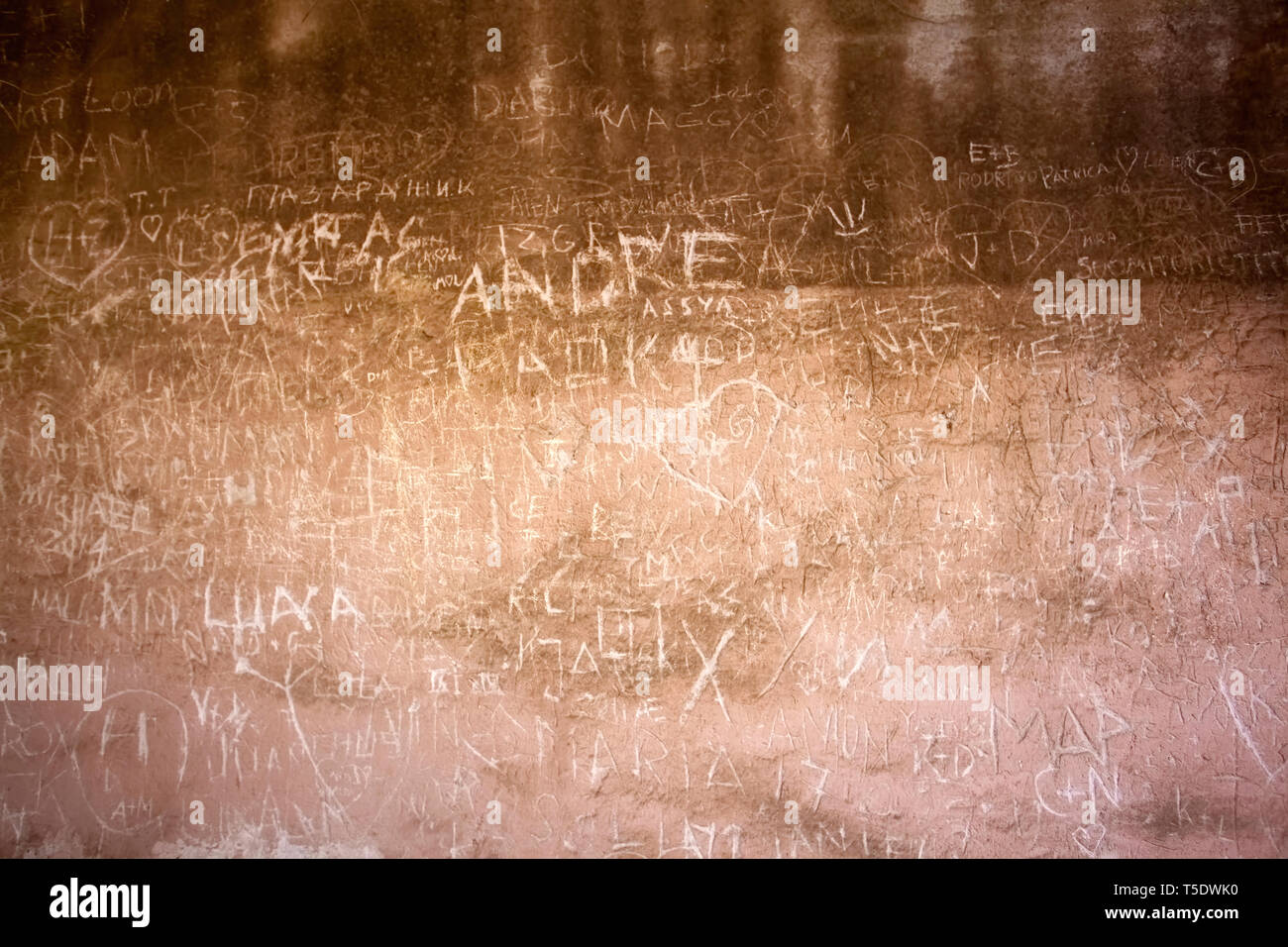 Artistic inscriptions of people's names and initials carved into ...