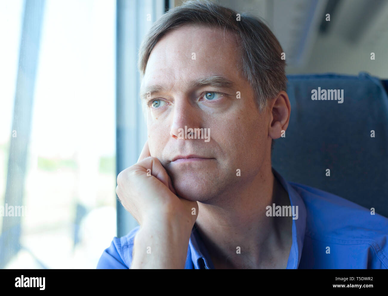 Hand in train window hi-res stock photography and images - Alamy