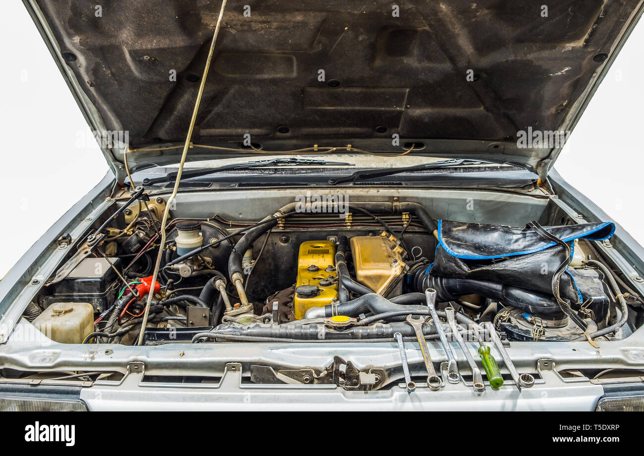 Car pick up old open engine with repair tools Stock Photo - Alamy