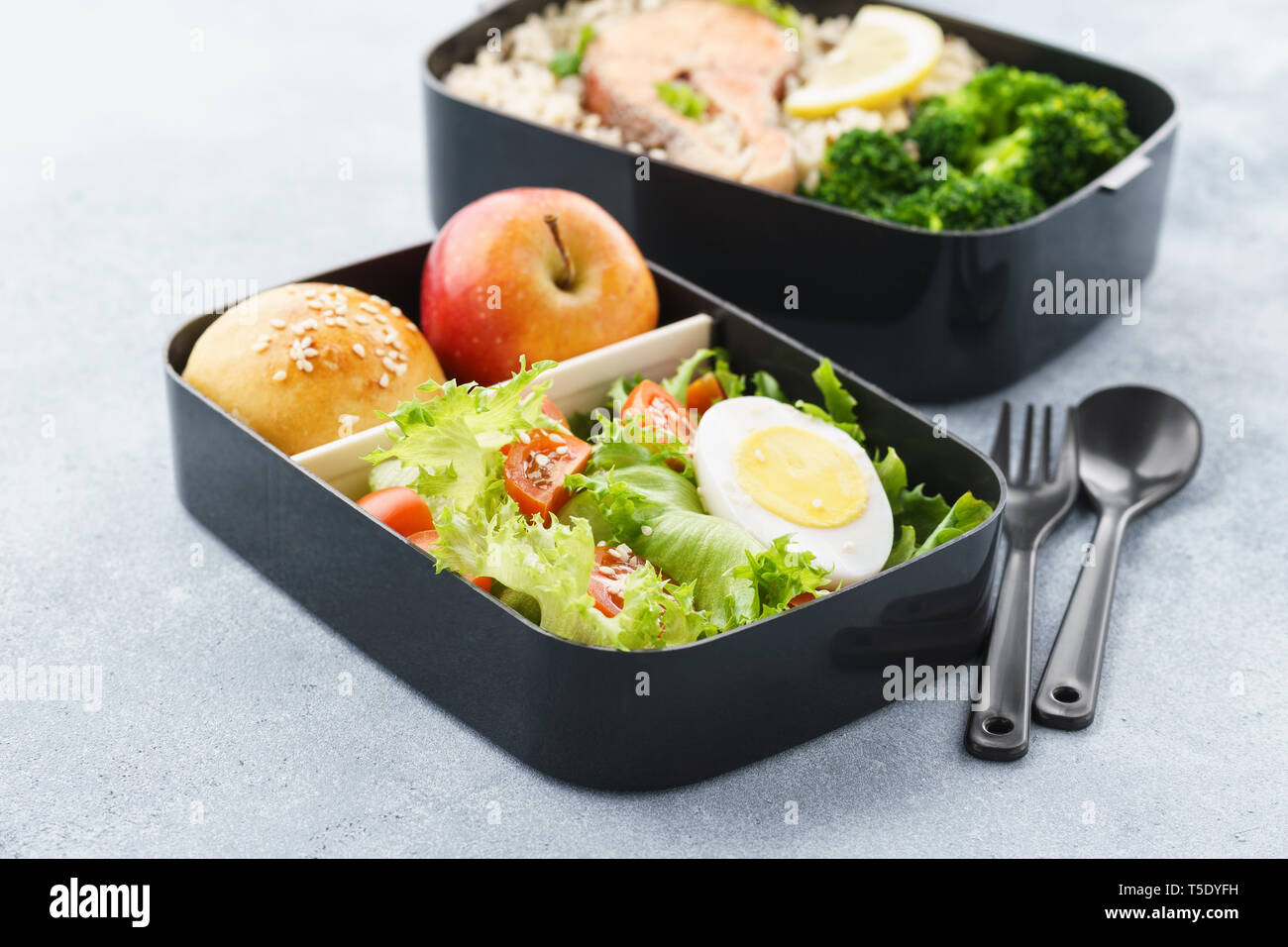 Various lunch boxes with healthy food and ingredients. Takeaway or ...