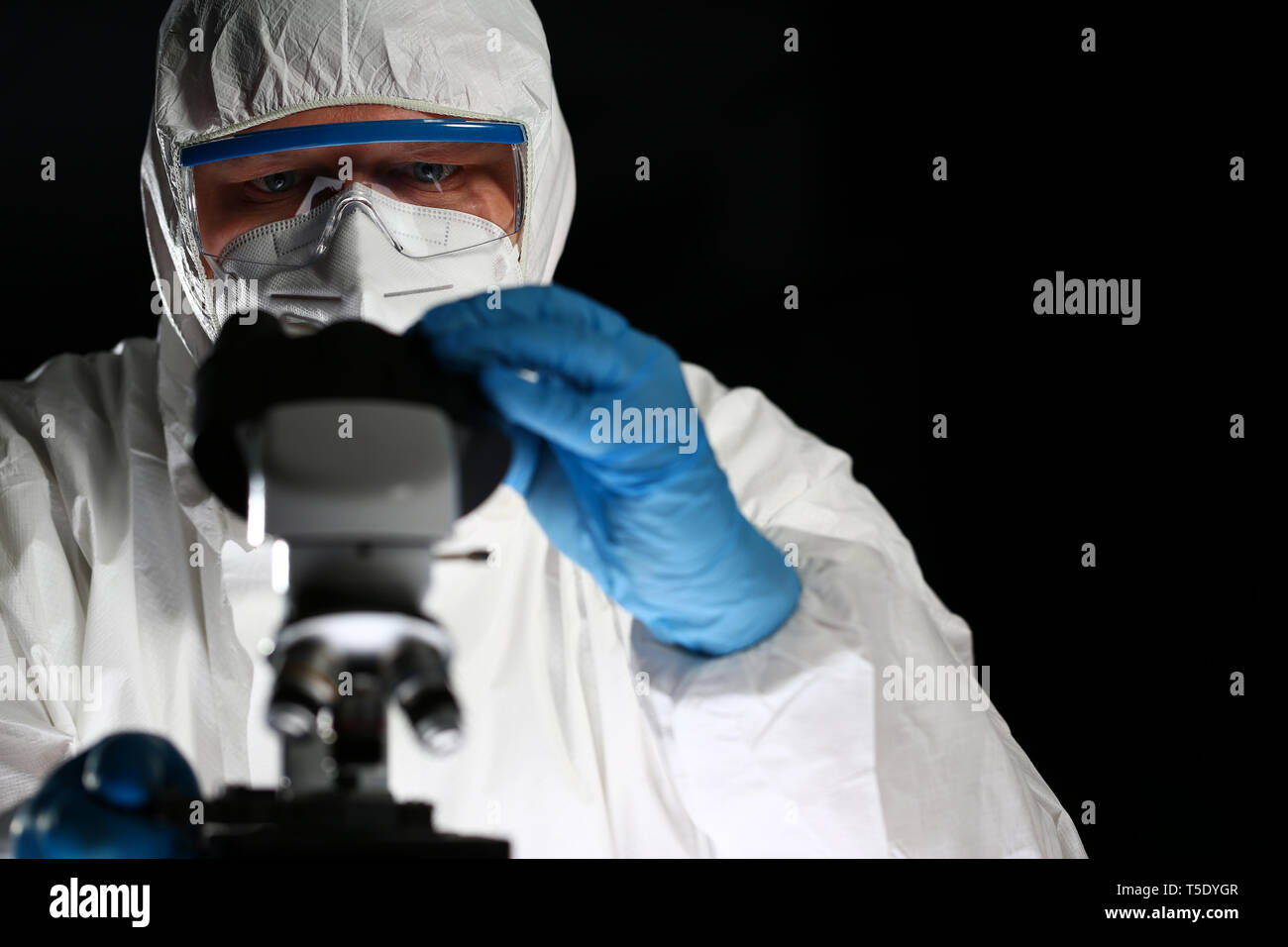 Scientist with microscope hi-res stock photography and images - Alamy