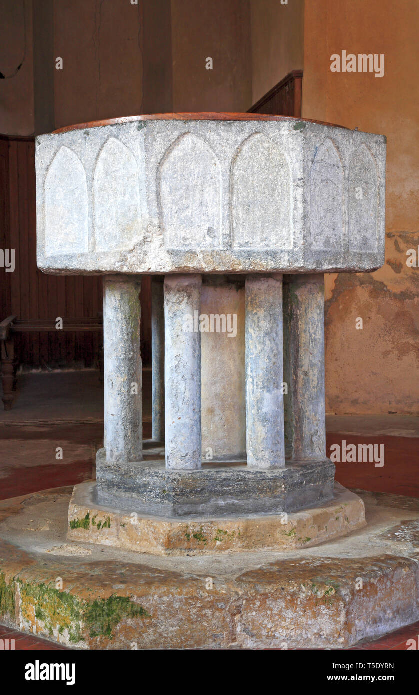 An octagonal Purbeck marble font in the Church of St Mary at Moulton St ...