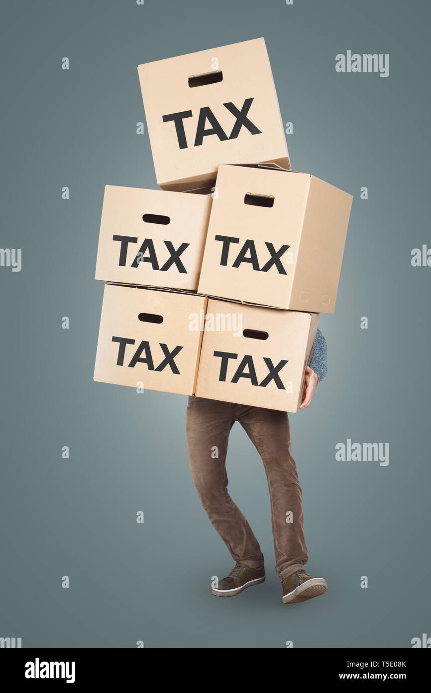 A person carrying a large stack of document storage boxes labeled with ...