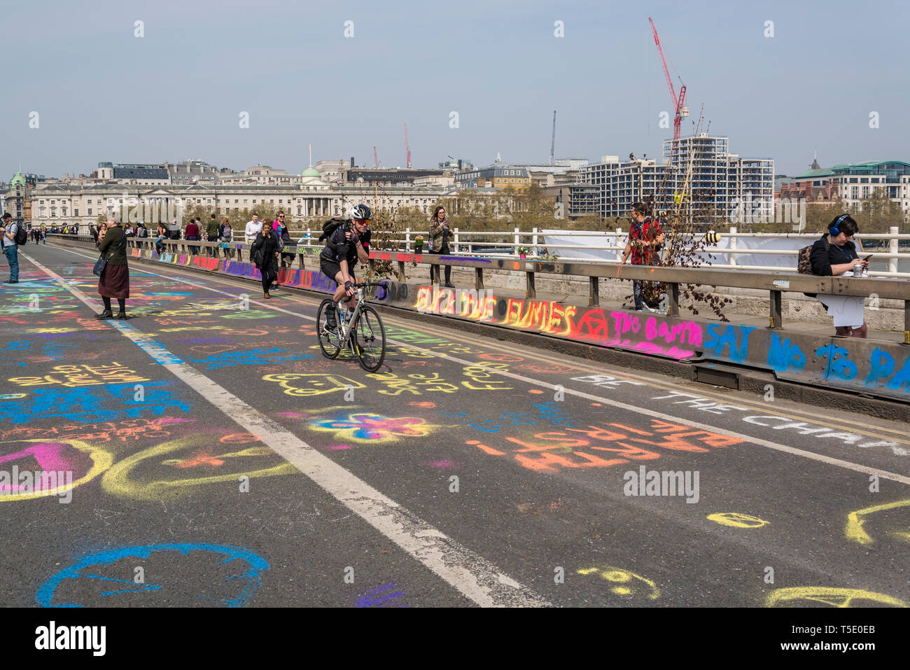 Extinction Rebellion protest on Waterloo Bridge, Road surface filled ...