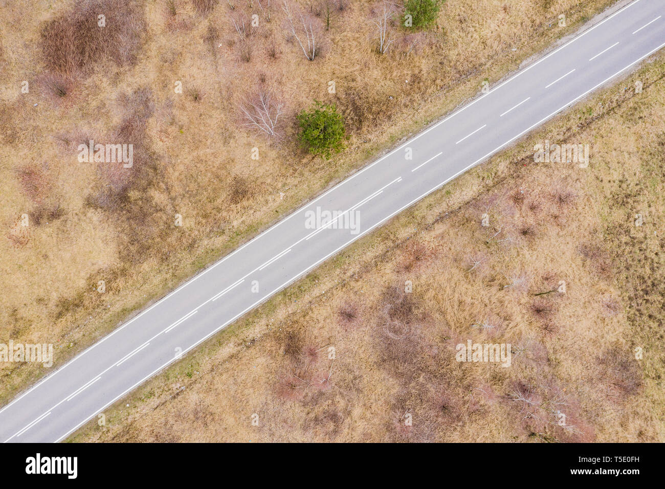 Aerial above view of a rural landscape with a road running. Drone ...